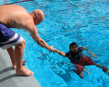 How to rescue a drowning victim using a reaching assist or a shepherd’s ...